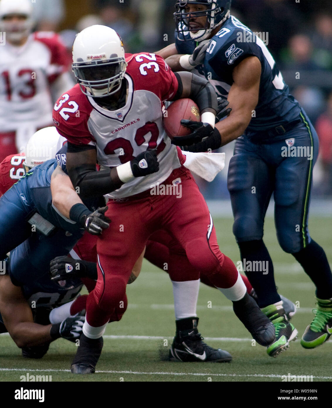 Arizona Cardinals' Edgerrin James breaks through the line for a short ...