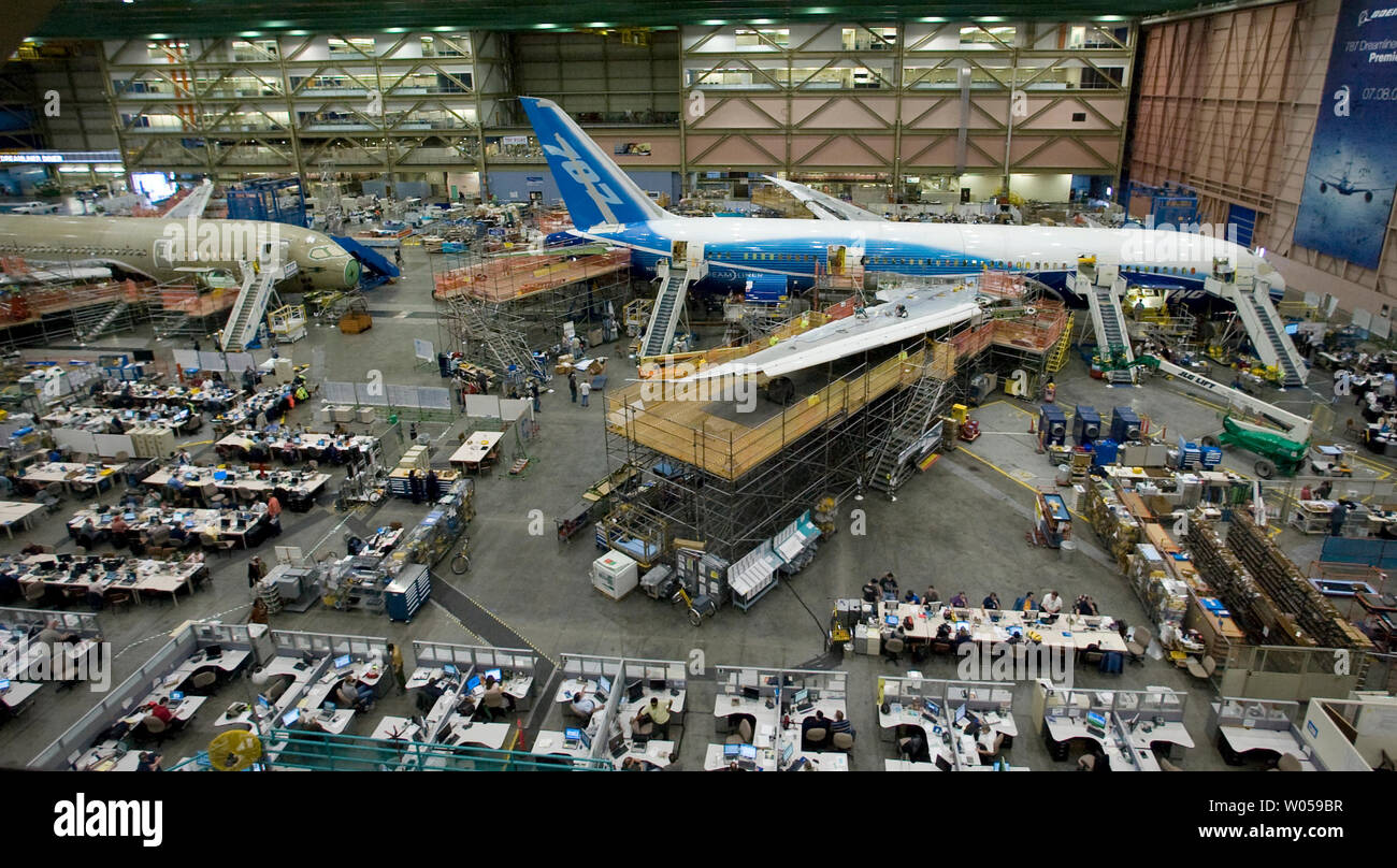Boeing 787 jets are lined-up nose to tail and surrounded by rows of ...