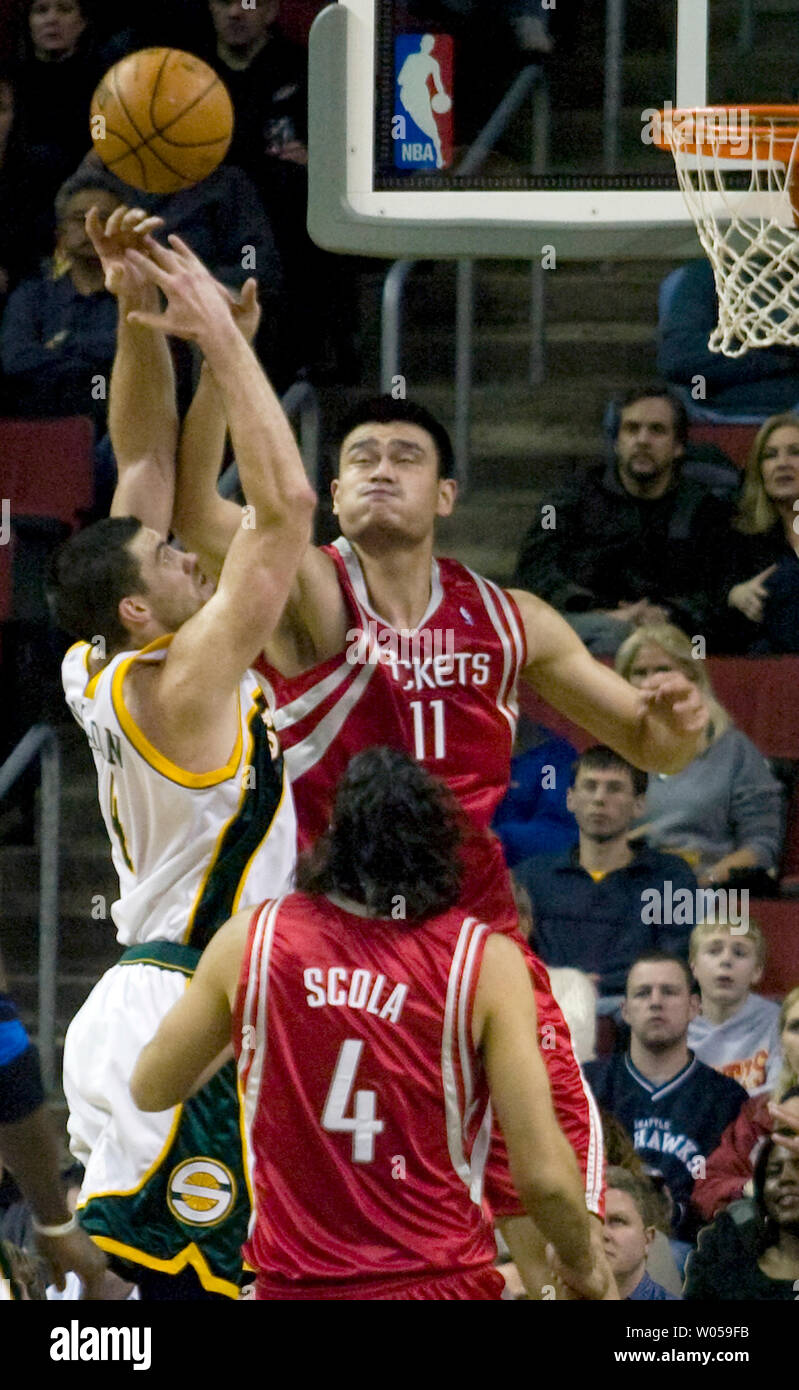 Houston Rockets' Yao Ming (L) of China, blocks a shot by Seattle ...