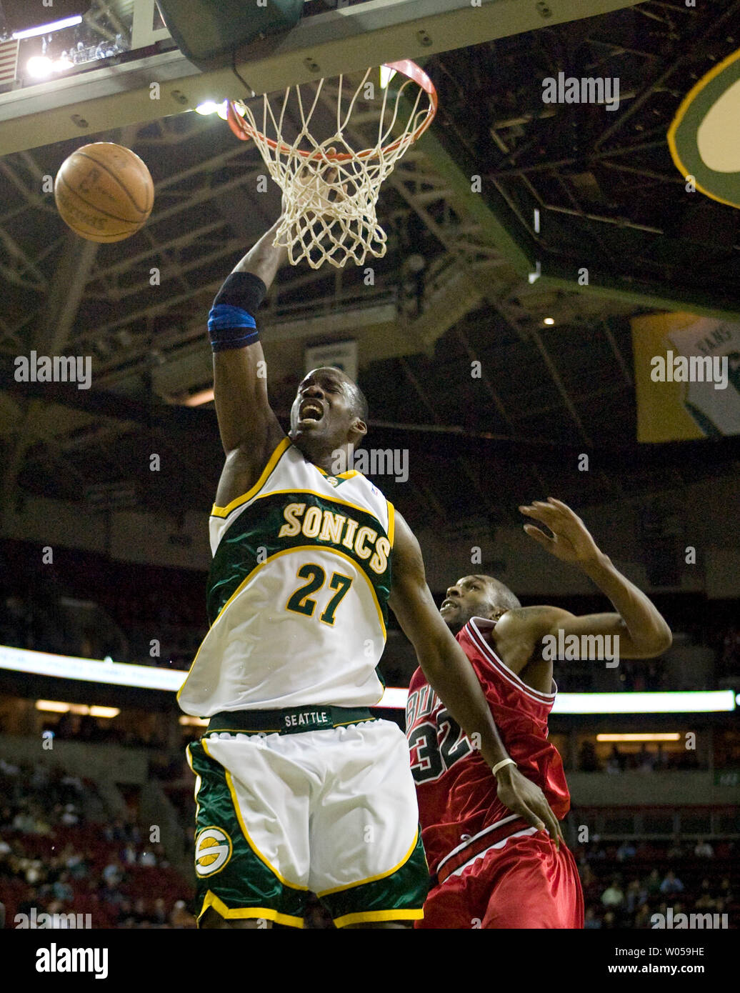 Seattle SuperSonics' Johan Petro, of France, (27) is fouled by Chicago ...