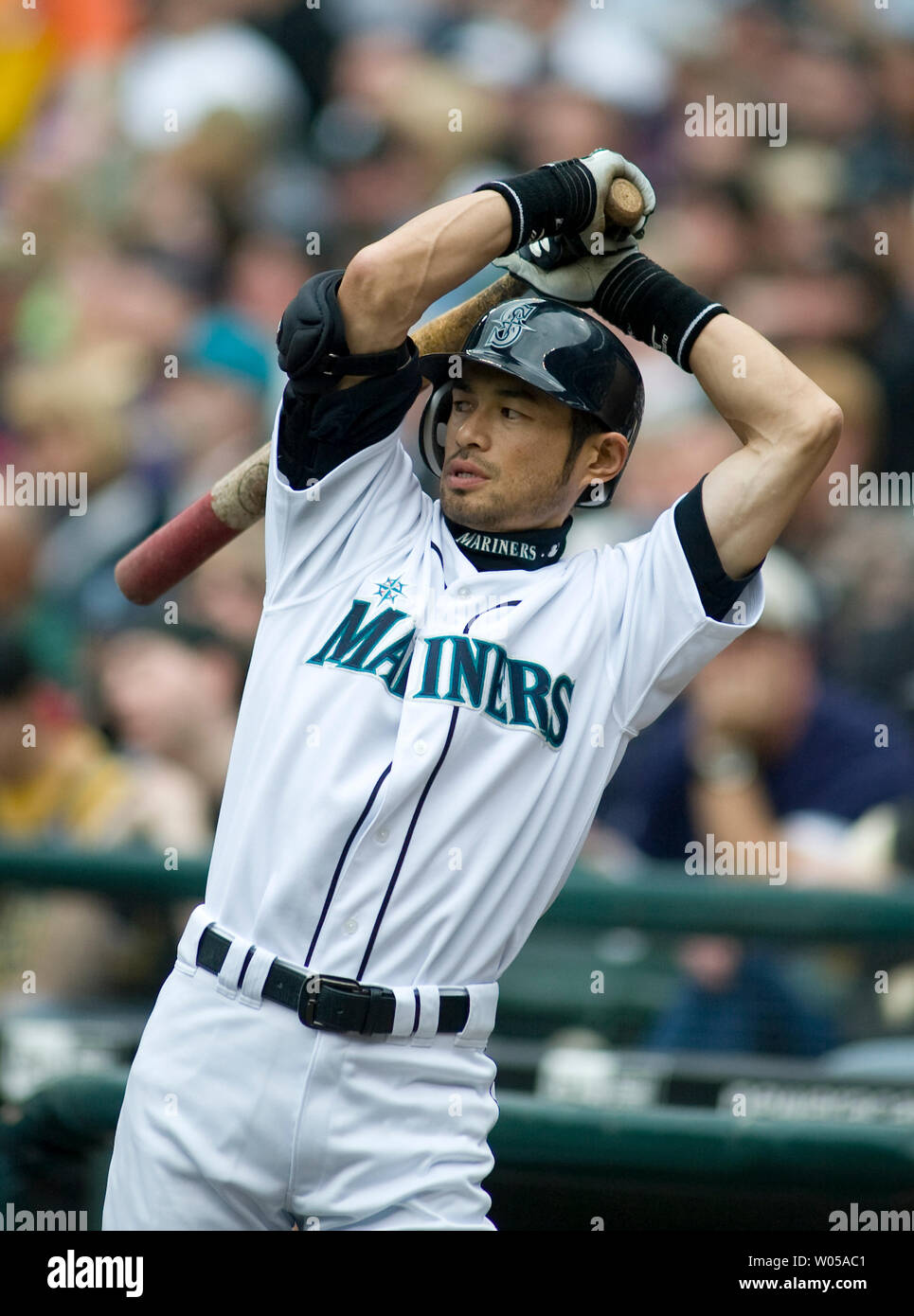 Seattle Mariners' Ichiro Suzuki, of Japan, warms up in the on-deck ...