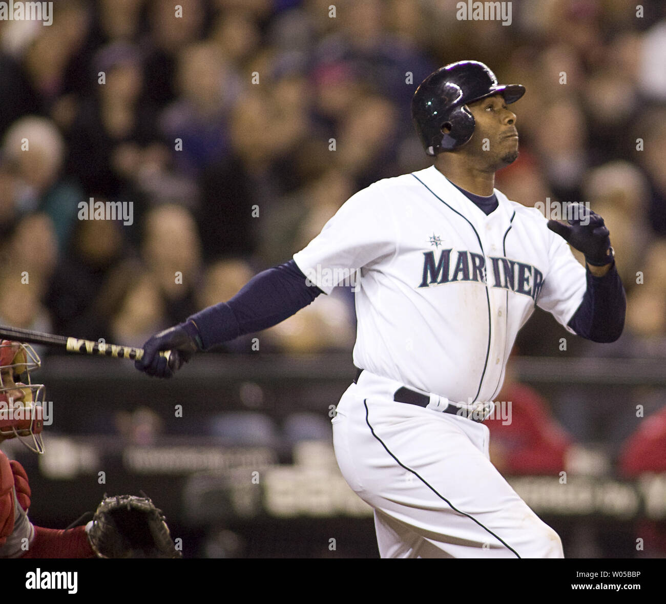 Seattle Mariners' Ken Griffey Jr., watches his solo home run to center ...