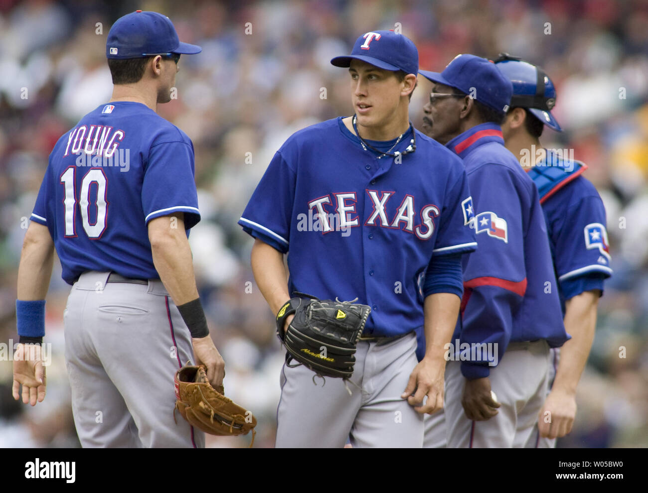 Texas Rangers' rookie pitcher Derek Holland is relieved in the seventh ...