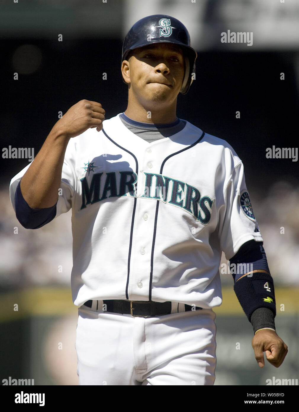 Seattle Mariners' Jose Lopez pumps his fists after hitting a single to ...