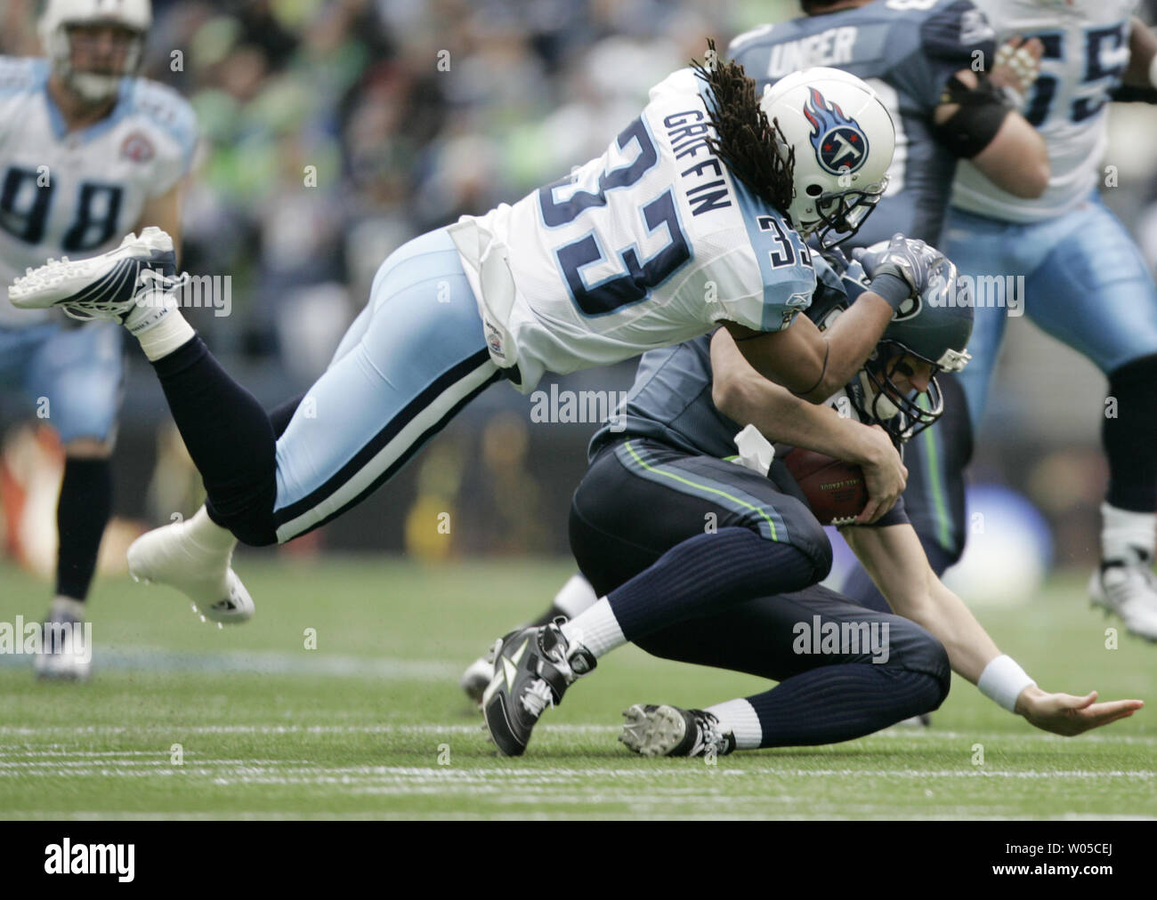 Tennessee Titans safety Michael Griffin (L) sacks Seattle Seahawks Matt ...