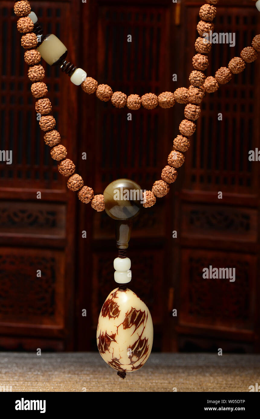 Ivory fruit pendant King Kong Bodhi necklace Stock Photo - Alamy