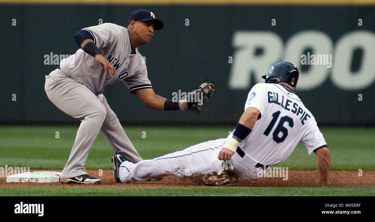 New York Yankees second baseman Brian Roberts tags out Seattle Mariners ...