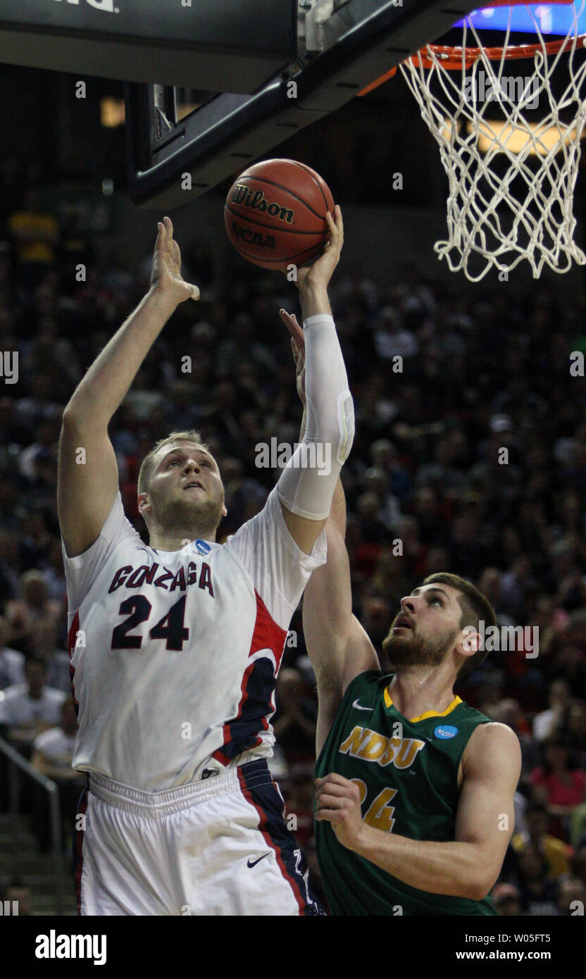 Gonzaga's Przemek Karnowski (24) hits a jump shot over North Dakota State's Chris Kading (34 ...
