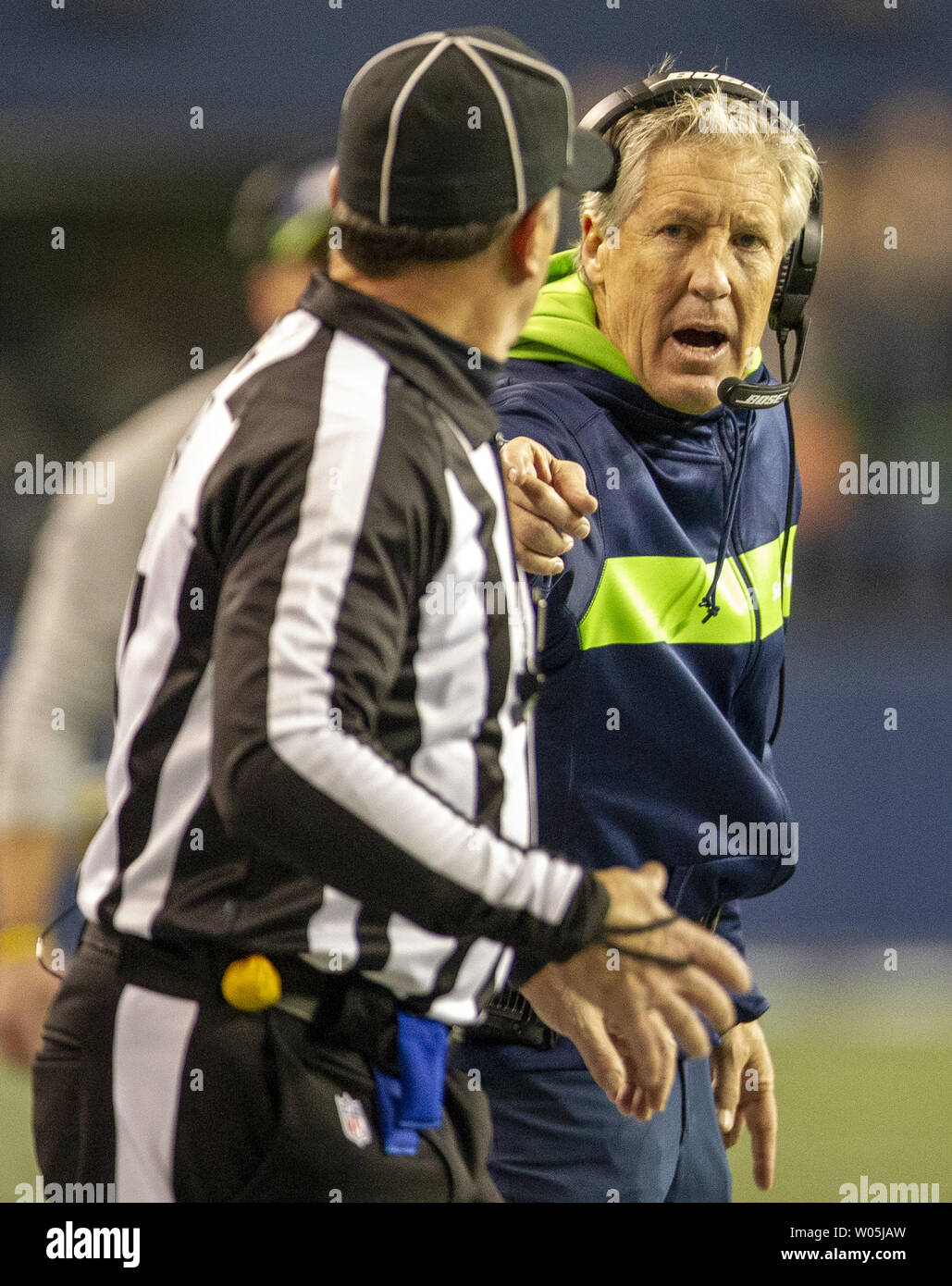 Seattle Seahawks head coach Pete Carroll questions a call made byLine ...