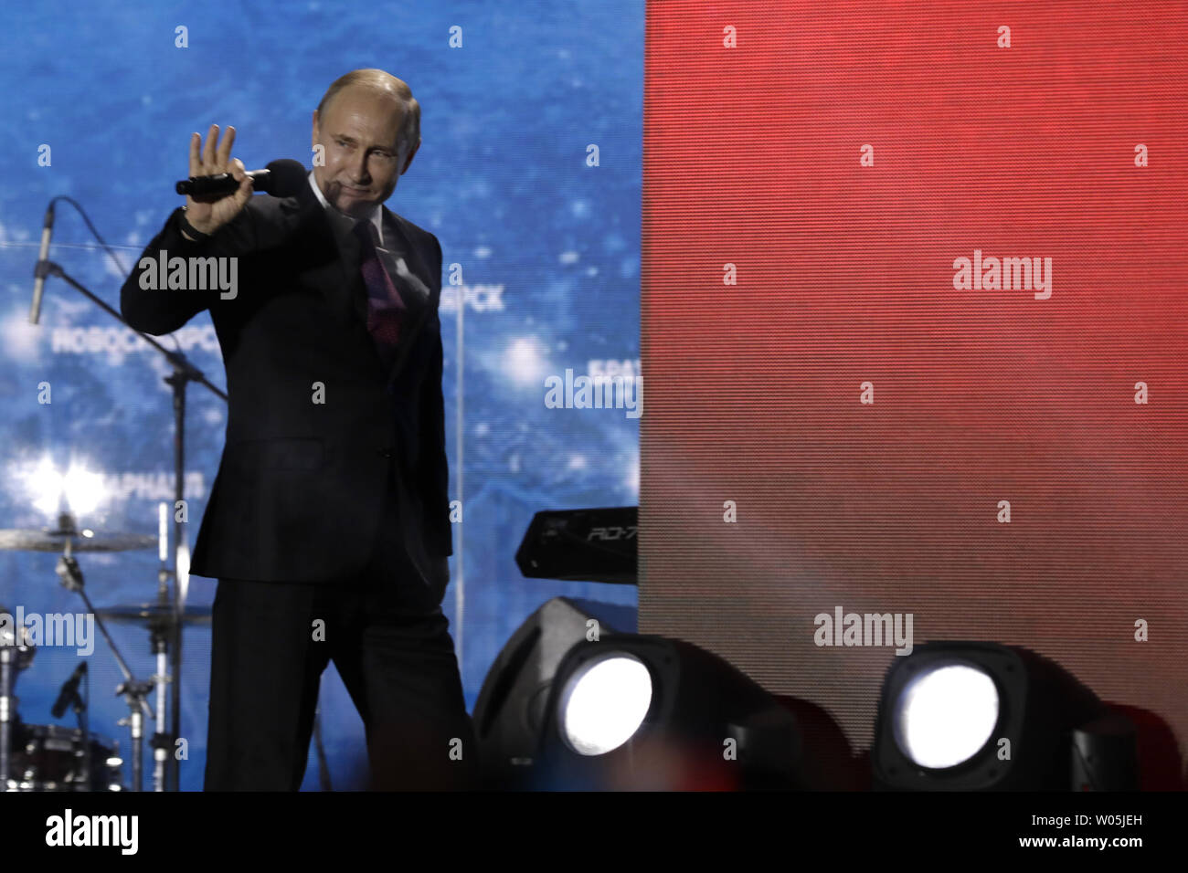 Russian President Vladimir Putin waves to the crowd on Nakhimov Square ...