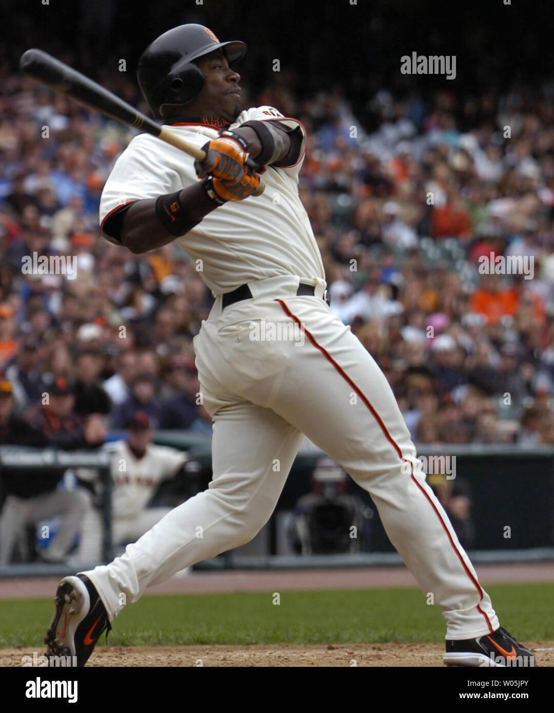 Giants second baseman Ray Durham connects for a triple in the 11th ...