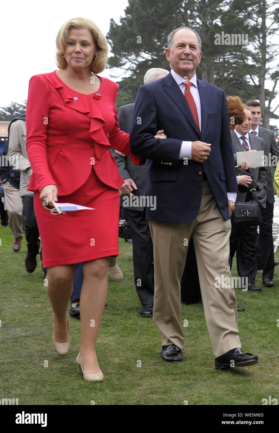 United States team Captains Assistant Jay Haas walks with his wife ...