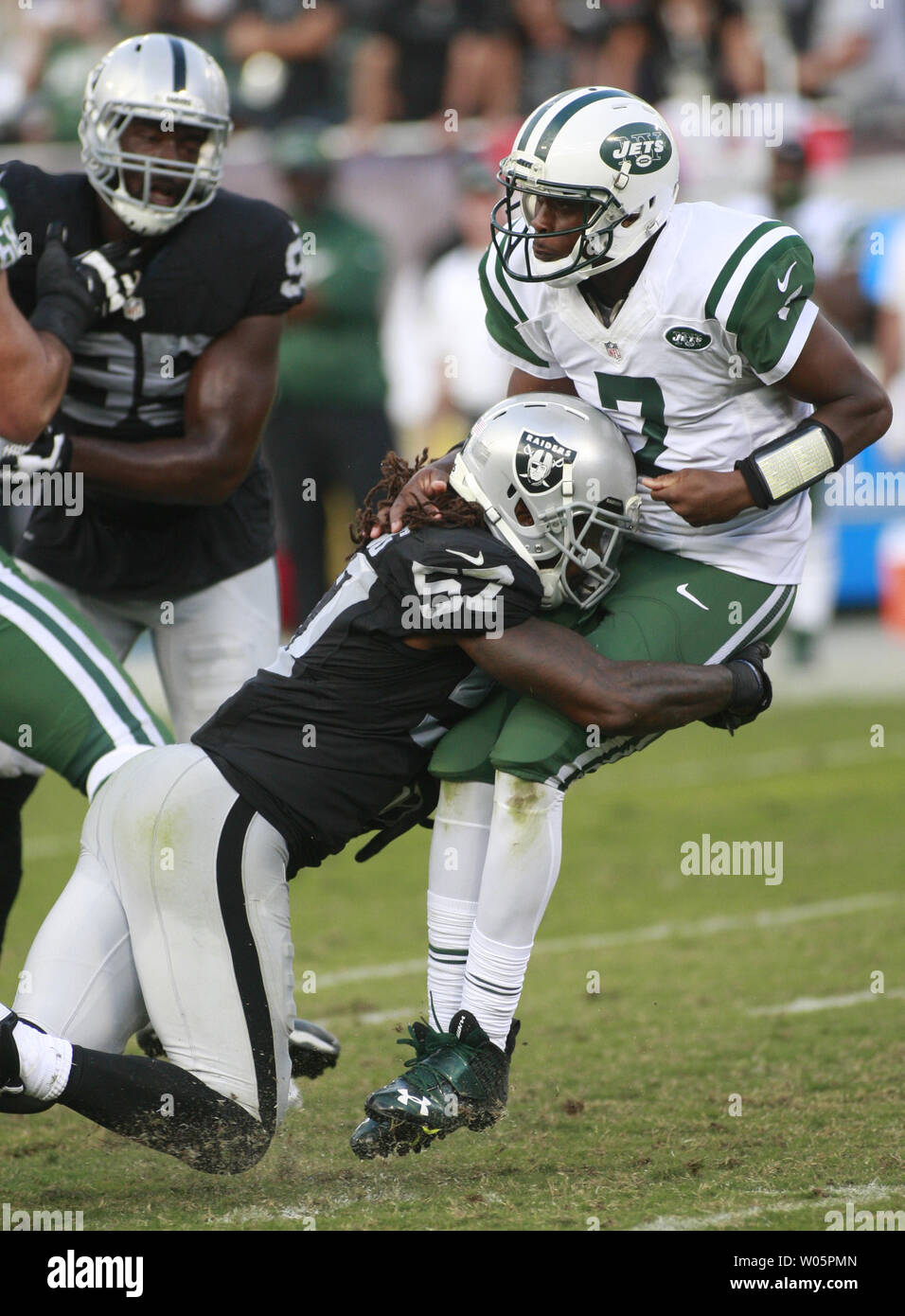 Oakland Raiders linebacker Ray-Ray Armstrong (57) puts a punishing hit ...