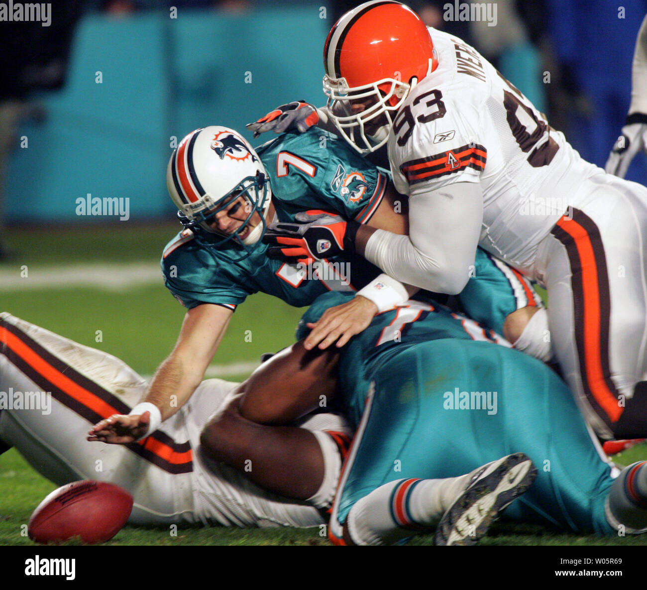 Miami Dolphins quarterback A.J. Feeley (7) fumbles a snap December 26 ...