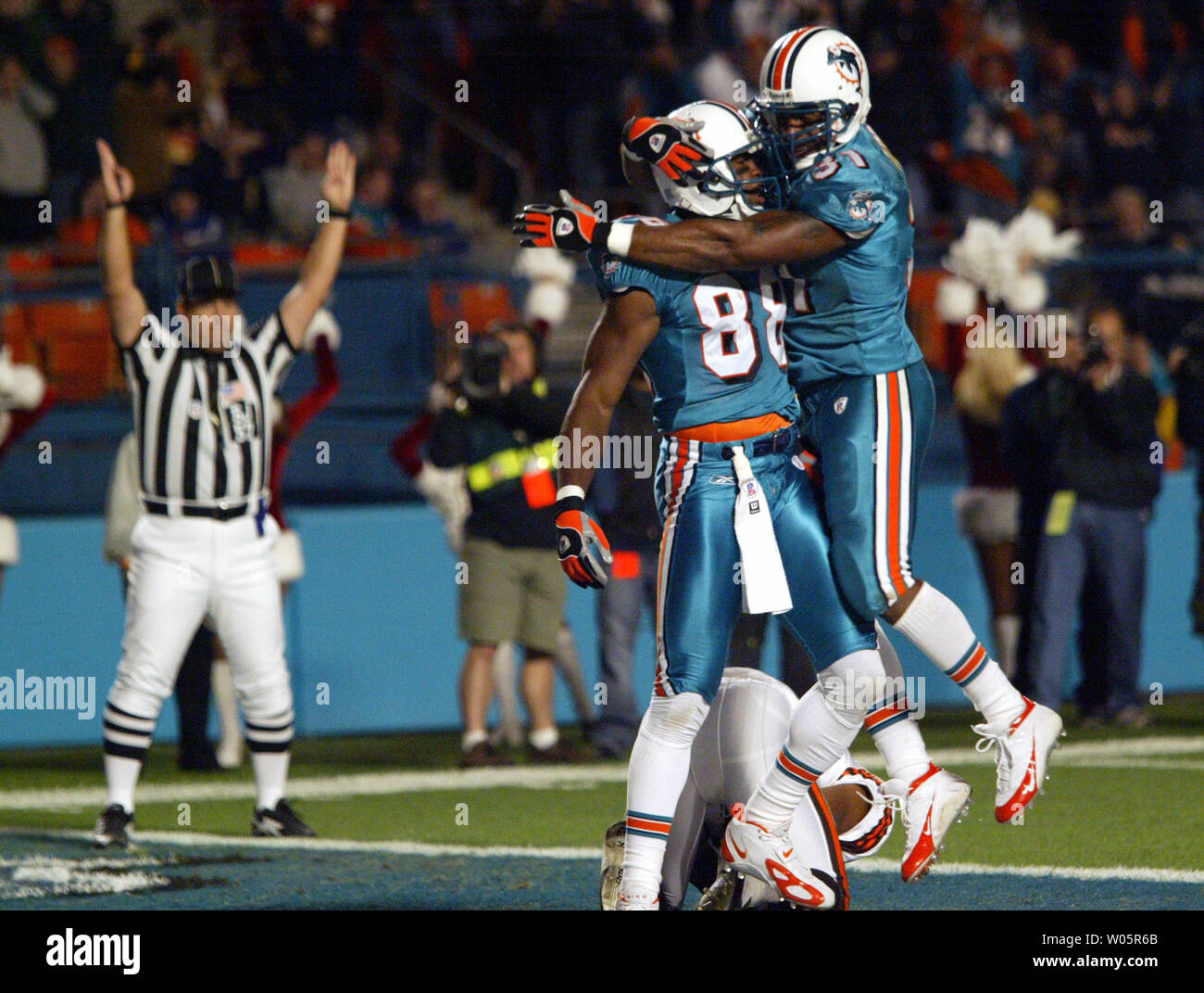 Miami Dolphins celebrate a touchdown December 26,2004 against the ...