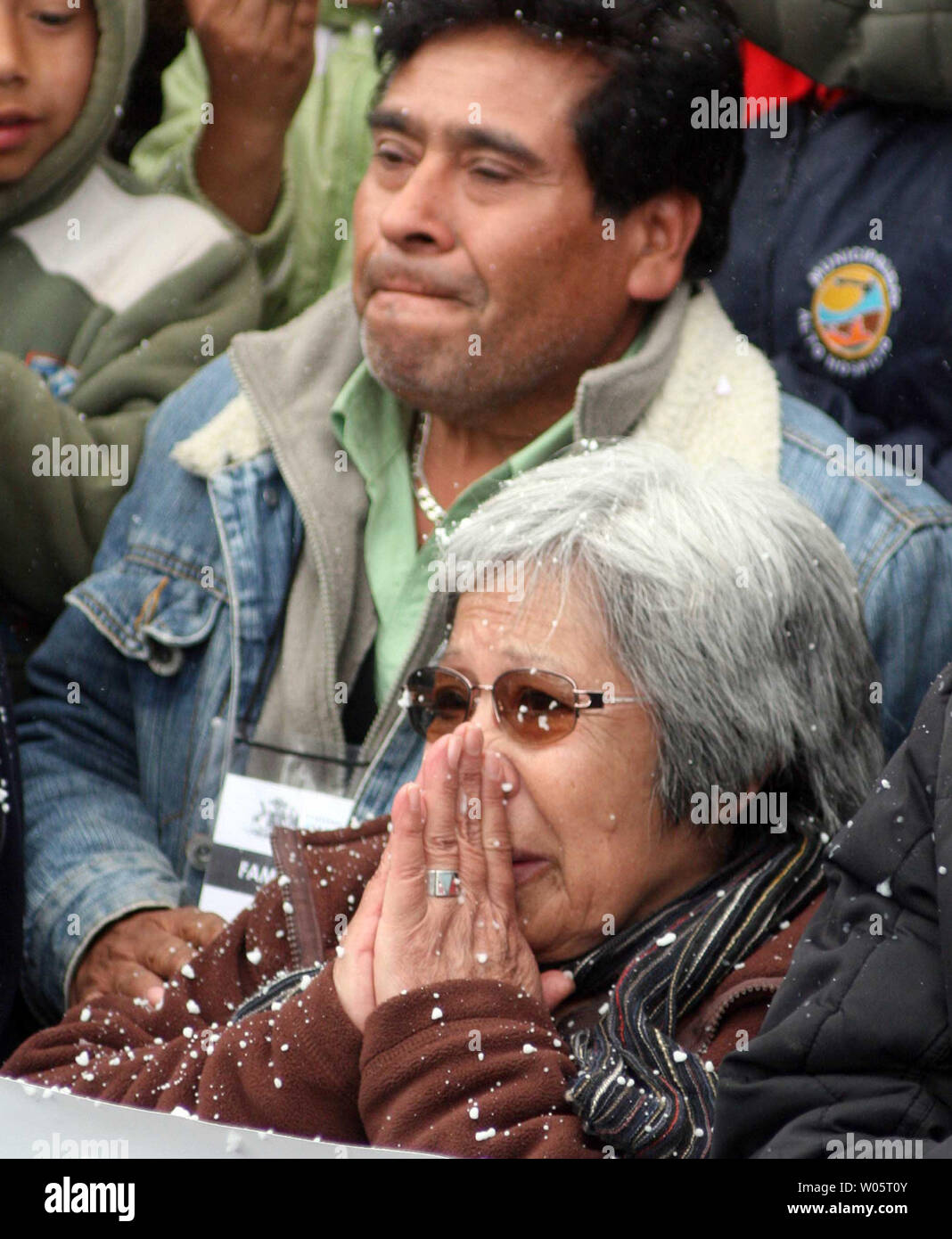 Family members of Chilean miners await their rescue, currently underway ...