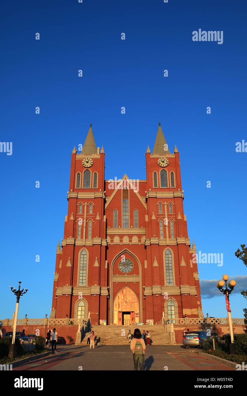 Ancient high rise building and traditional evening gothic architecture ...