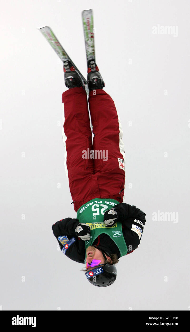 Canadian aerialist Jeff Bean, 27, performs a quadruple-twisting triple ...