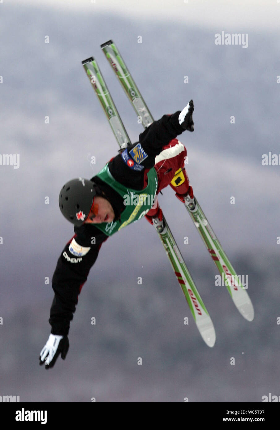 Canadian aerialist Warren Shouldice, 21, performs a quadruple-twisting ...