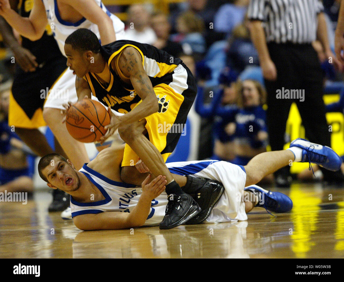 Saint Louis University Billikens' Anthony Drajaj gets under the feet of ...