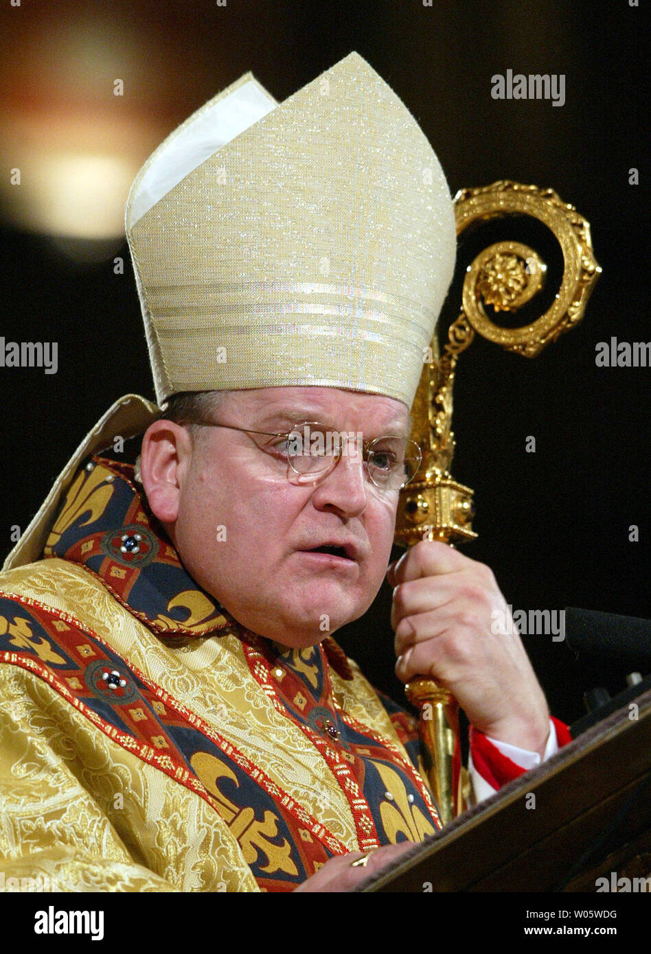 The new Archbishop of St. Louis, Raymond Burke, delivers his homily ...