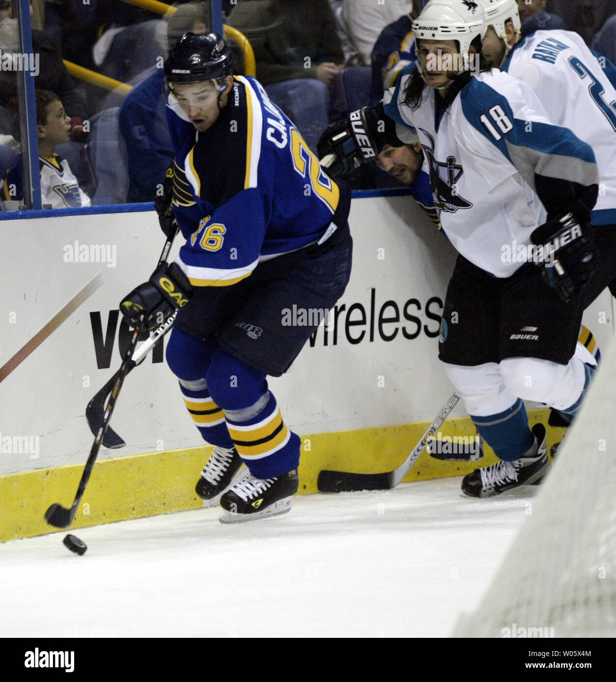 St. Louis Blues Petr Cajanek (26) eacapes with the puck after tying up ...