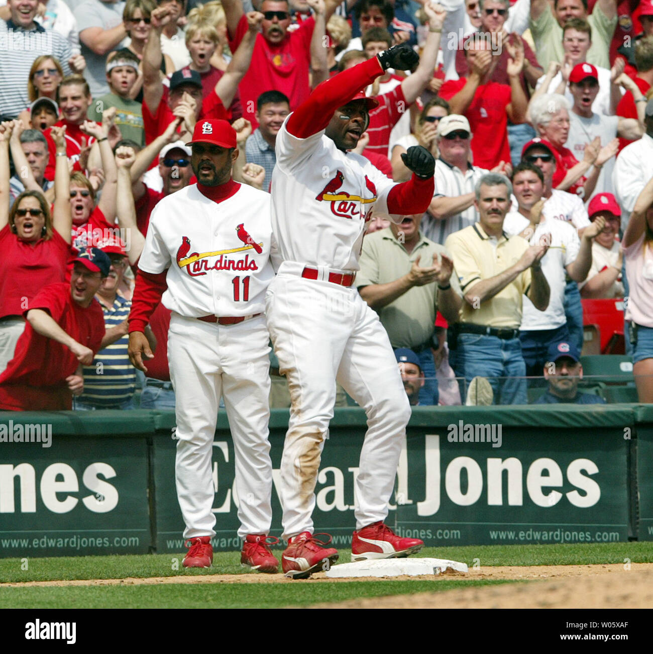St. Louis Cardinals Reggie Sanders (R) celebrates his three-run scoring ...