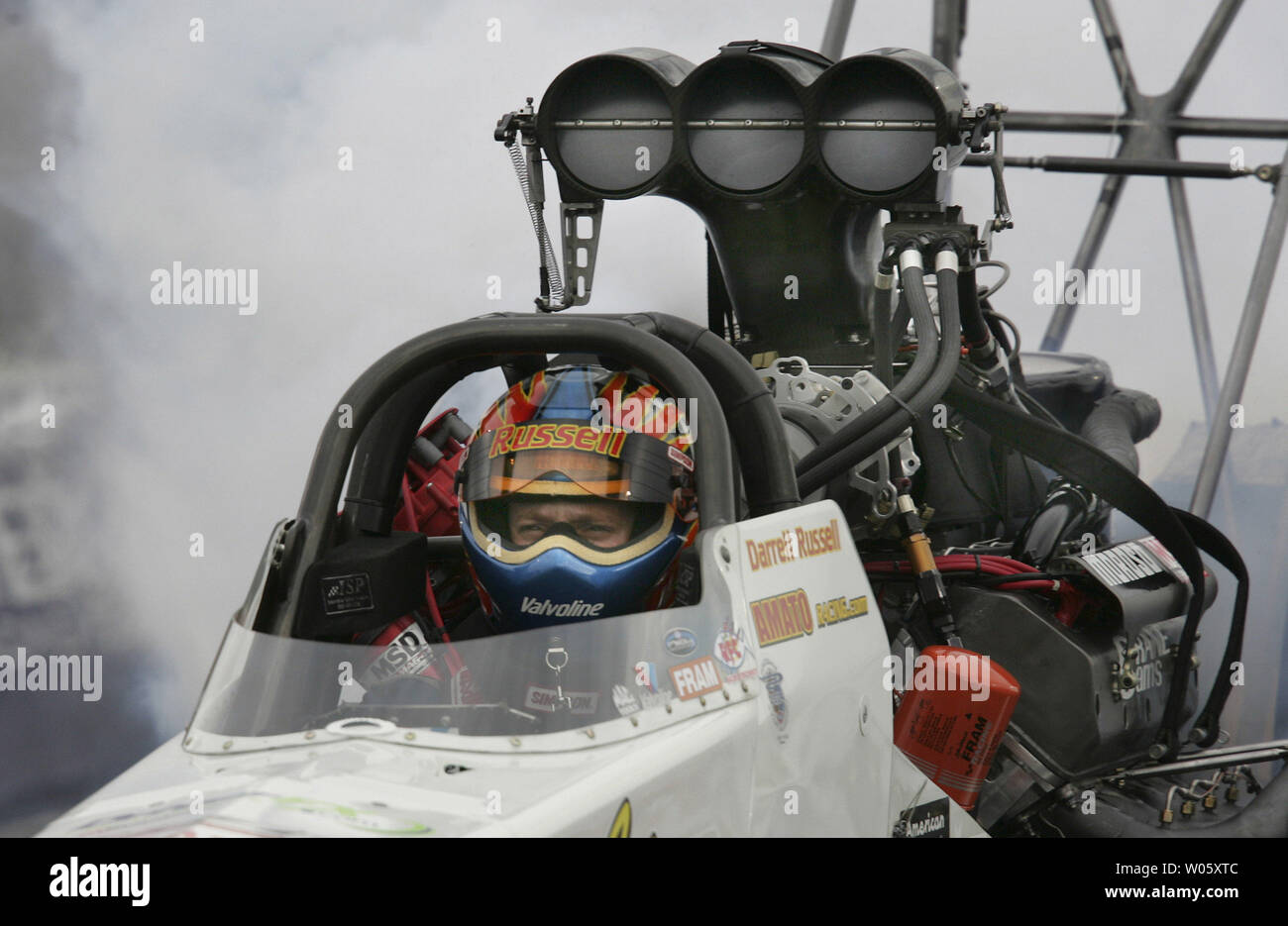Top Fuel driver Darrell Russell takes off from the start during the ...