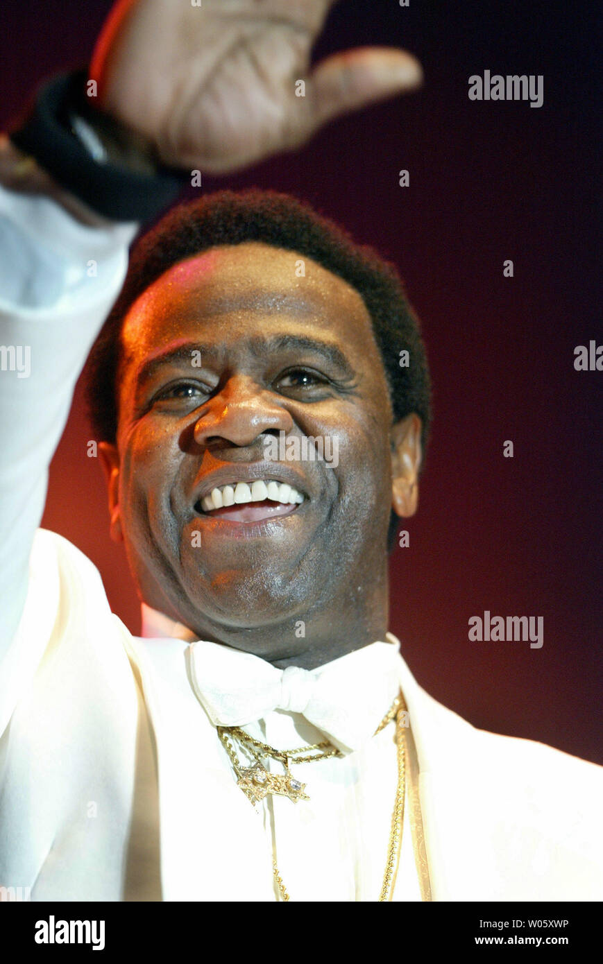 Singer Al Green waves to the crowd during his performance underneath ...