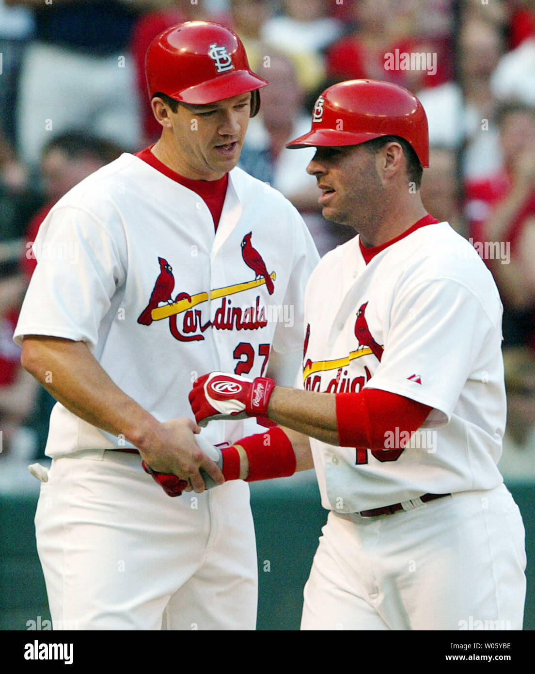 St. Louis Cardinals Jim Edmonds (R) is congratulated by Scott Rolen at ...