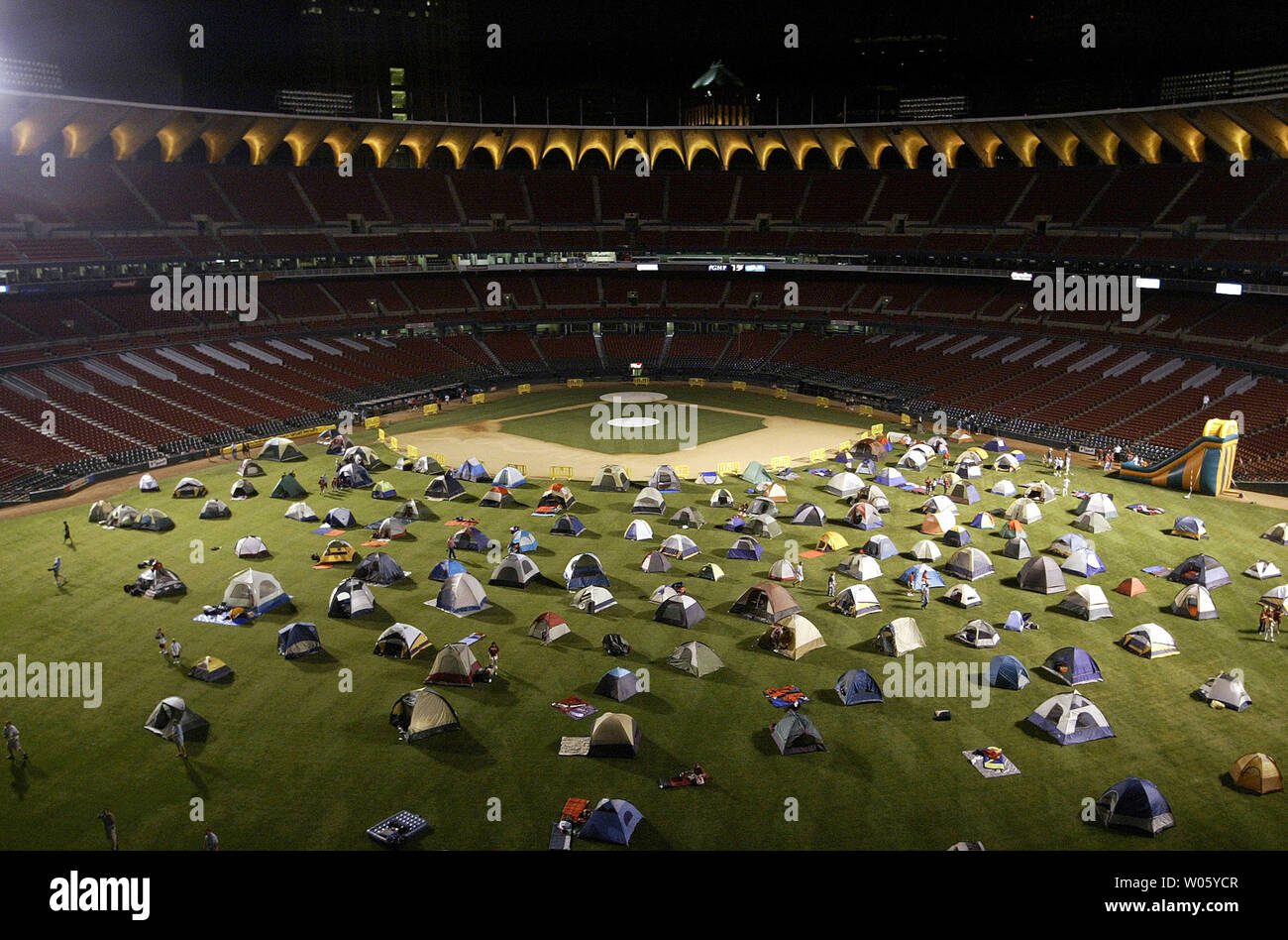 Nearly 300 campers set up tents on the Busch Stadium outfield to watch ...
