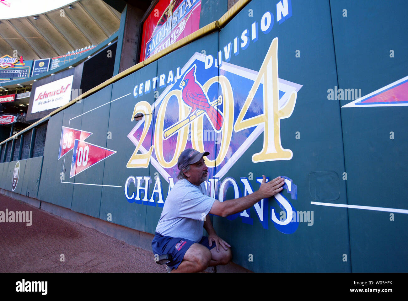 Busch Stadium grounds keeper Terry Moll makes final adjustments to a ...