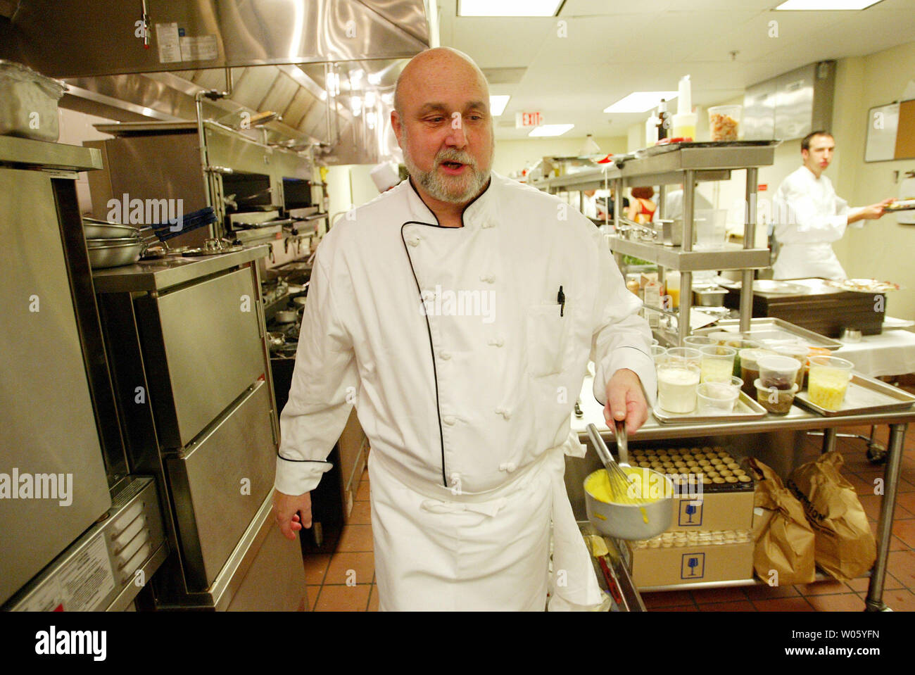 Famed chef and restaurateur Larry Forgione moves through his kitchen ...