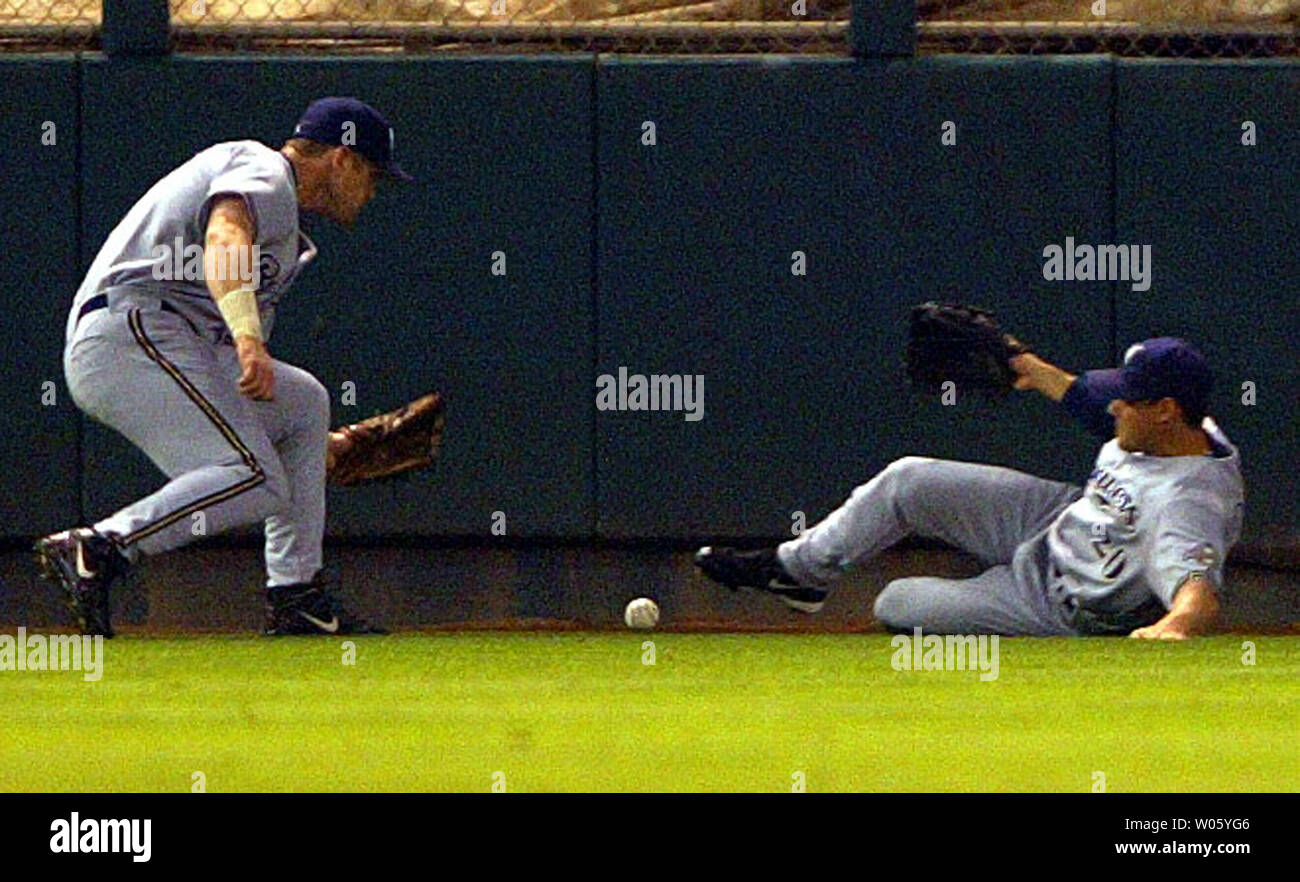 Milwaukee Brewers left-fielder Geoff Jenkins (L) and center- fielder ...