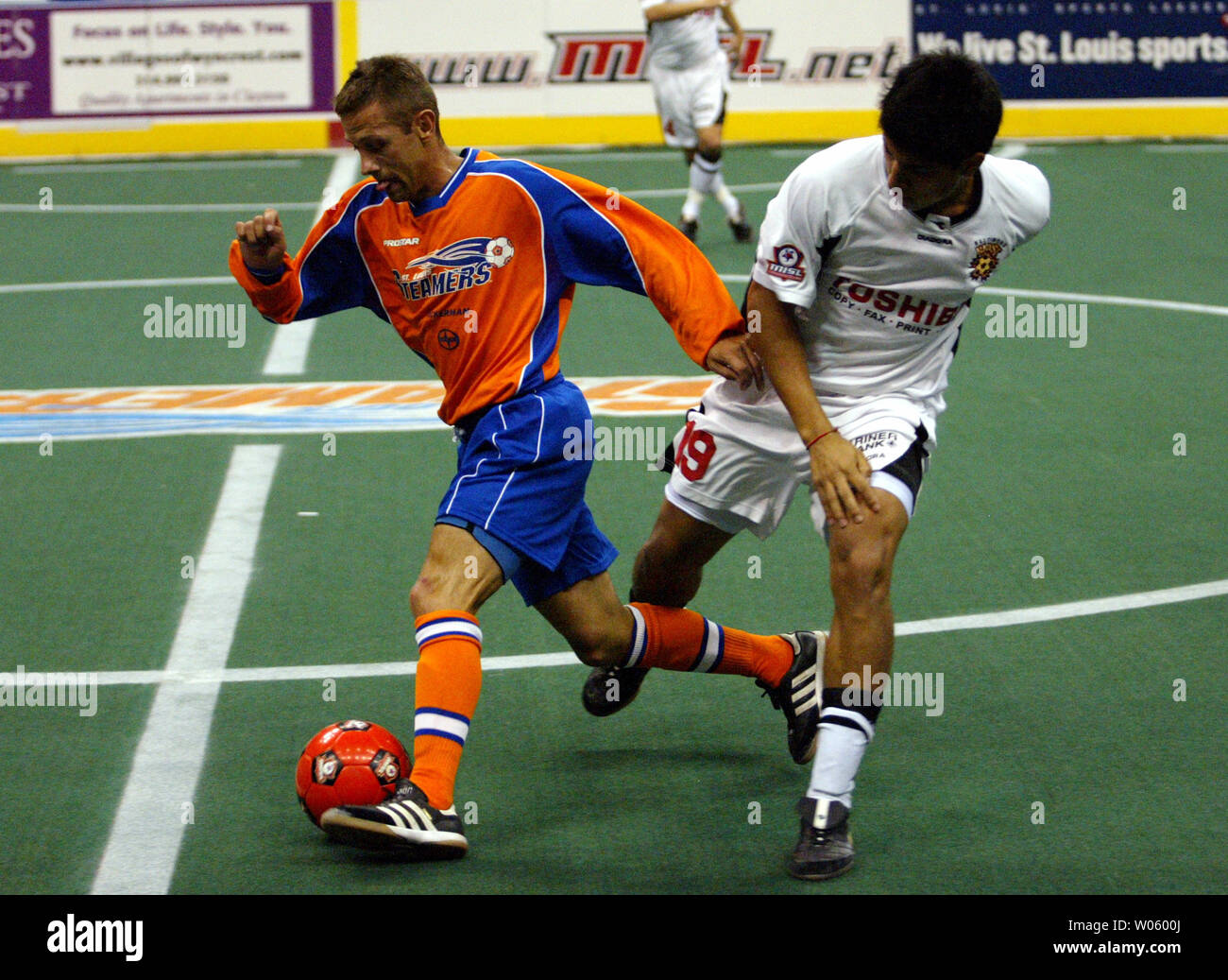 L dribbles past hi-res stock photography and images - Alamy