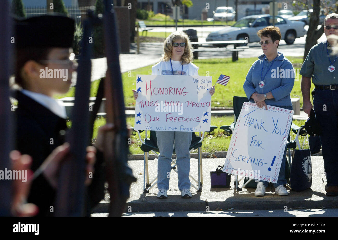 Chris Sikora (L) and her mother Diana of Florissant, Mo hold signs of ...