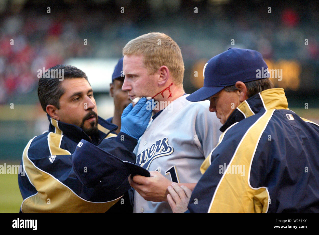Milwaukee Brewers first baseman Lyle Overbay is attended to by medical ...
