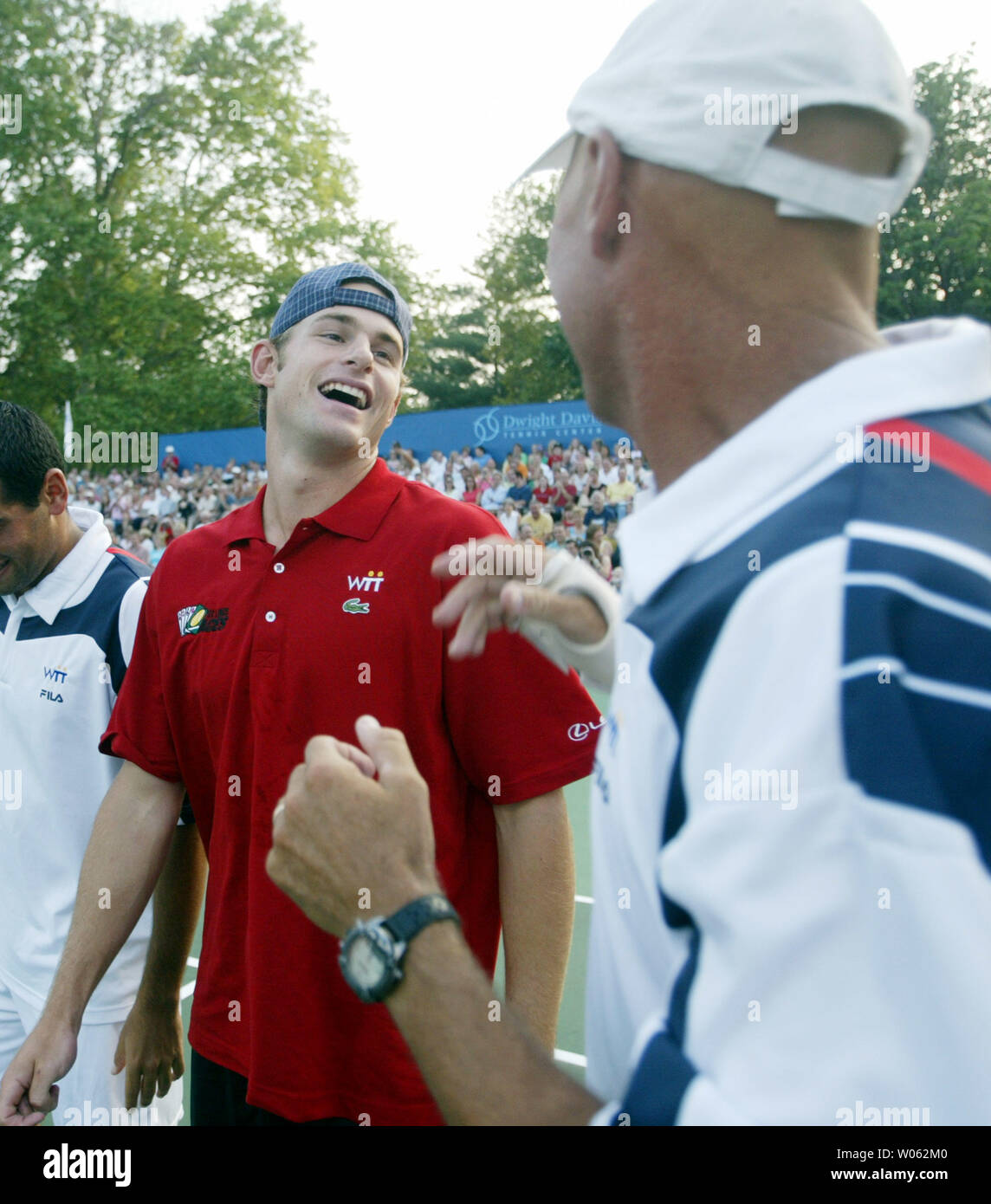 Wimbleton tennis finalist Andy Roddick (L) jokes with coach Greg Patton ...