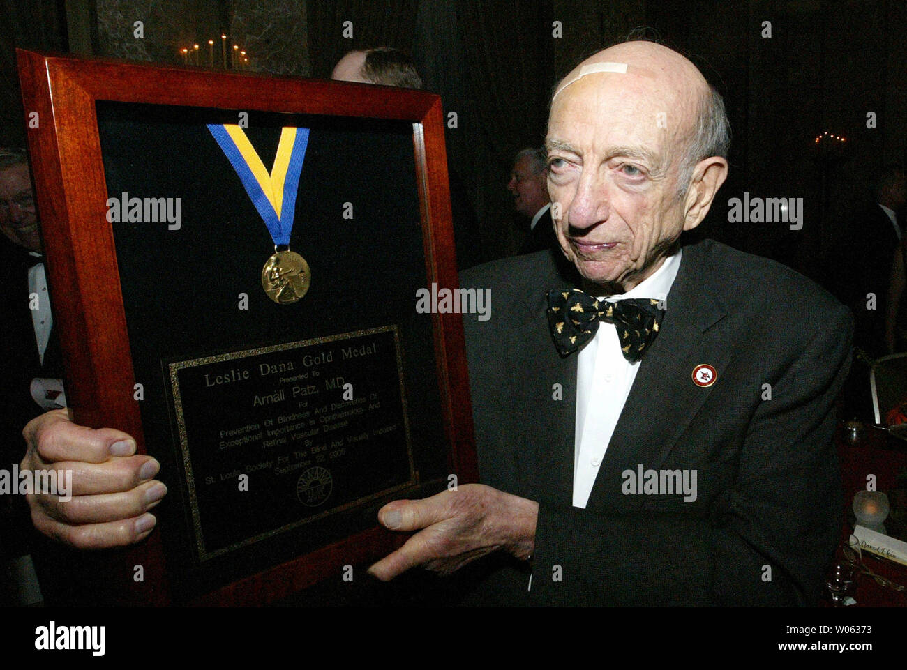 Dr. Arnell Patz of Baltimore, proudly displays the Leslie Dana Gold ...