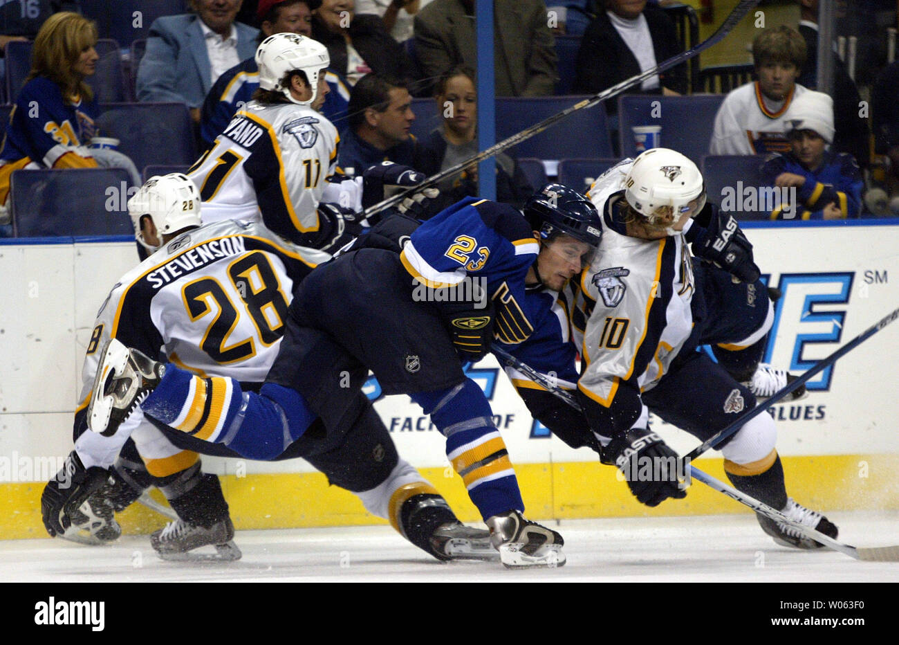 St. Louis Blues Trent Whitfield (23) collides with Nashville Predators ...