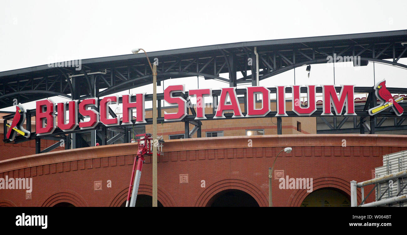 Construction workers check their work as they complete the Busch ...