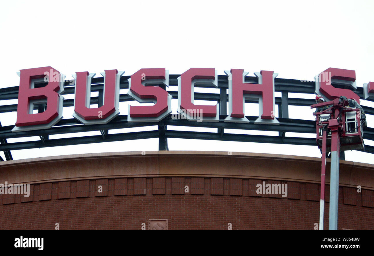 Construction workers check their work as they complete the Busch ...