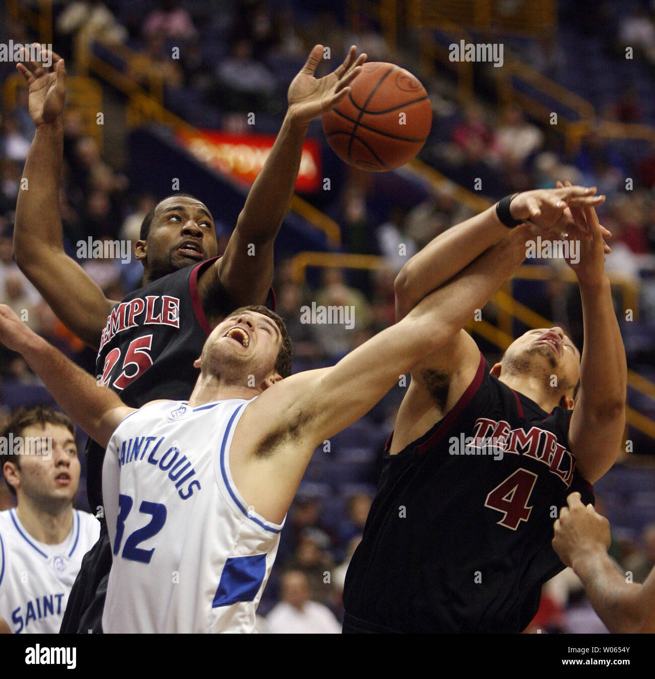 Saint Louis University's Luke Meyer (32) goes up for a rebound against ...