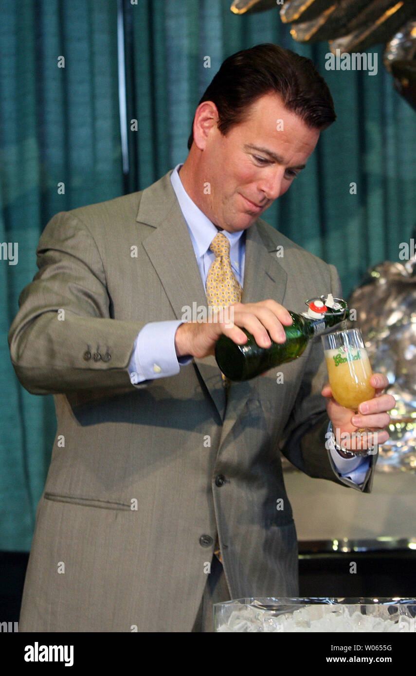 August A. Busch IV, President of Anheuser-Busch Cos., pours a Grolsch ...