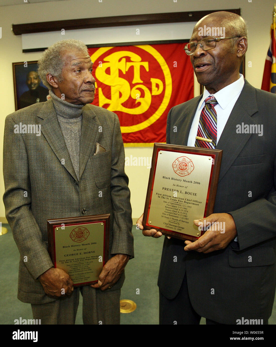 St. Louis Fire Department retired Deputy Chief George Horne (L) talks ...