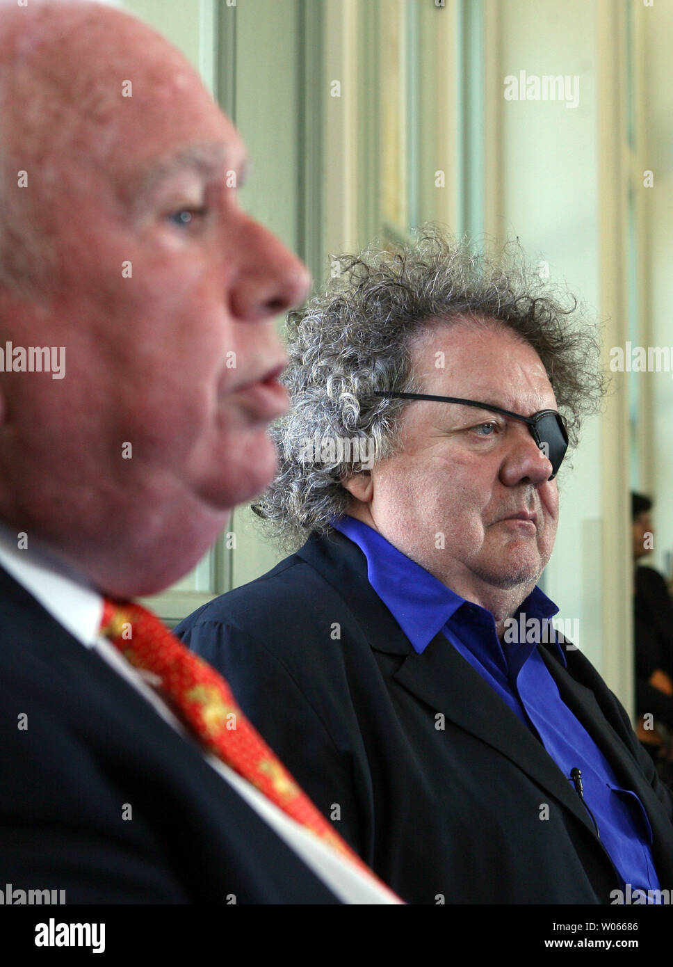 Peter Raven, (L) director of the Missouri Botanical Garden, introduces ...