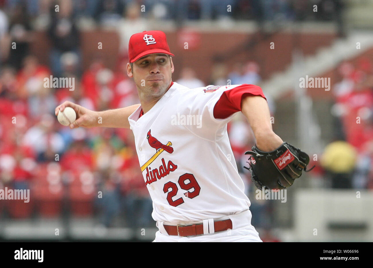 St. Louis Cardinals pitcher Chris Carpenter delivers a pitch to the ...