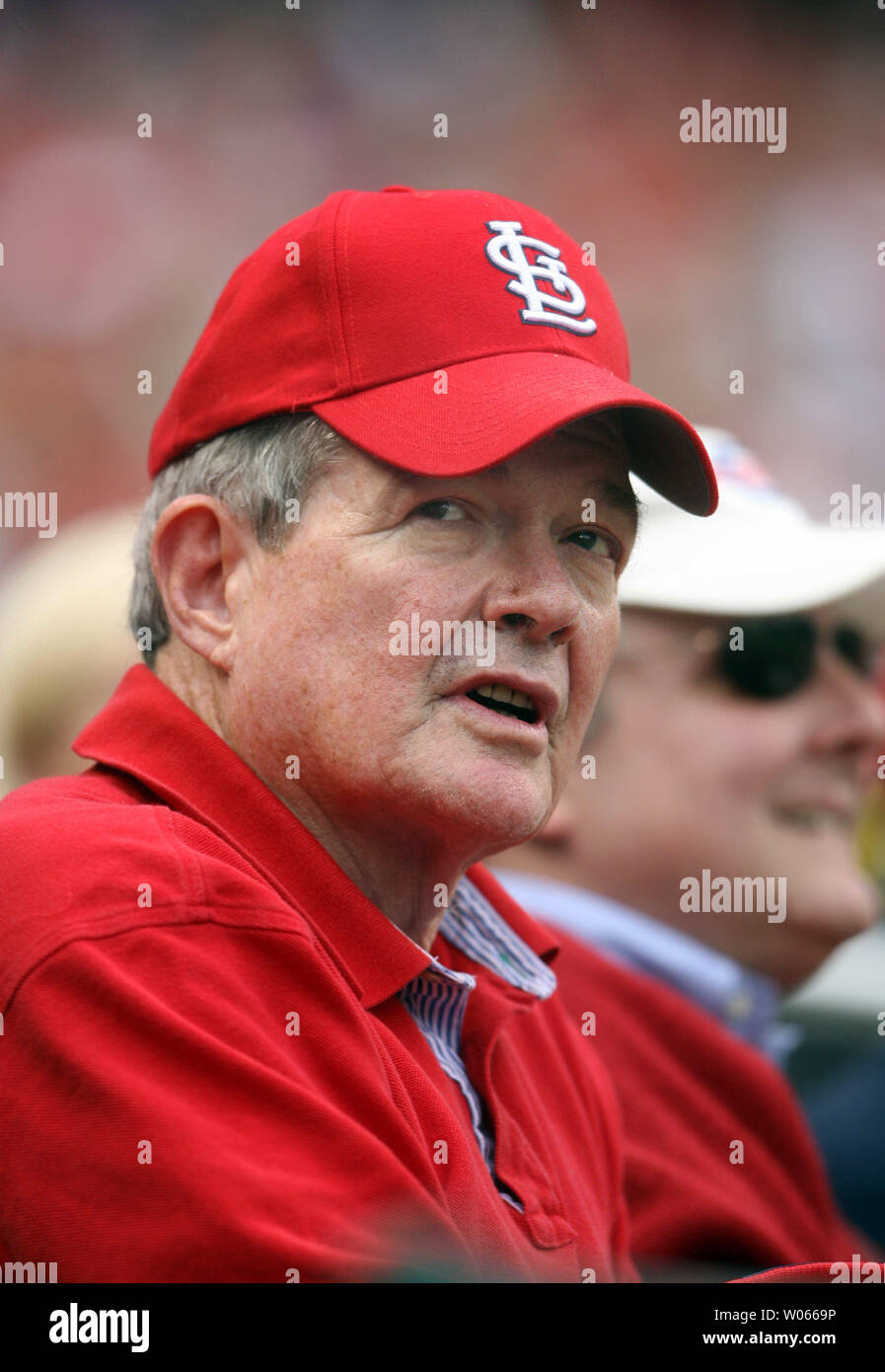 Missouri Senator Christopher "Kit" Bond watches the St. Louis Cardinals ...