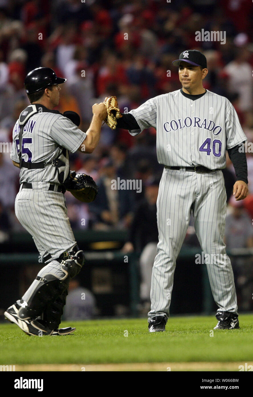 Colorado Rockies pitcher Brian Fuentes (40) is congratulated by catcher ...
