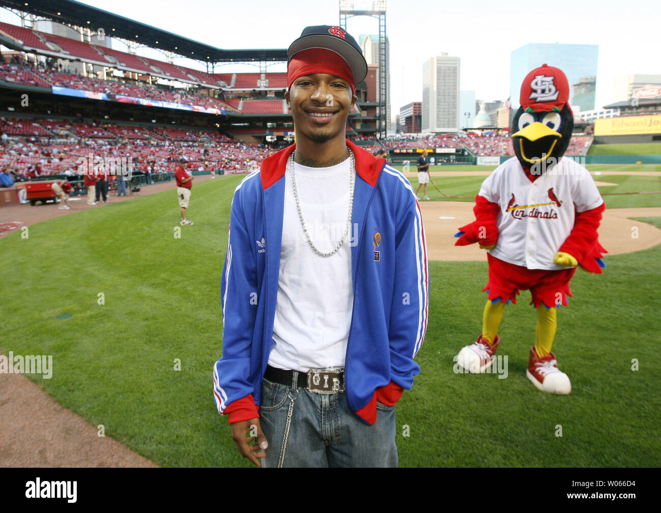 Rap singer Chingy is introduced to the crowd before a game between the ...